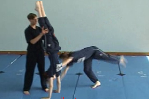 Cartwheel with a 1/4 twist sideways into a Handstand. | Sportplan
